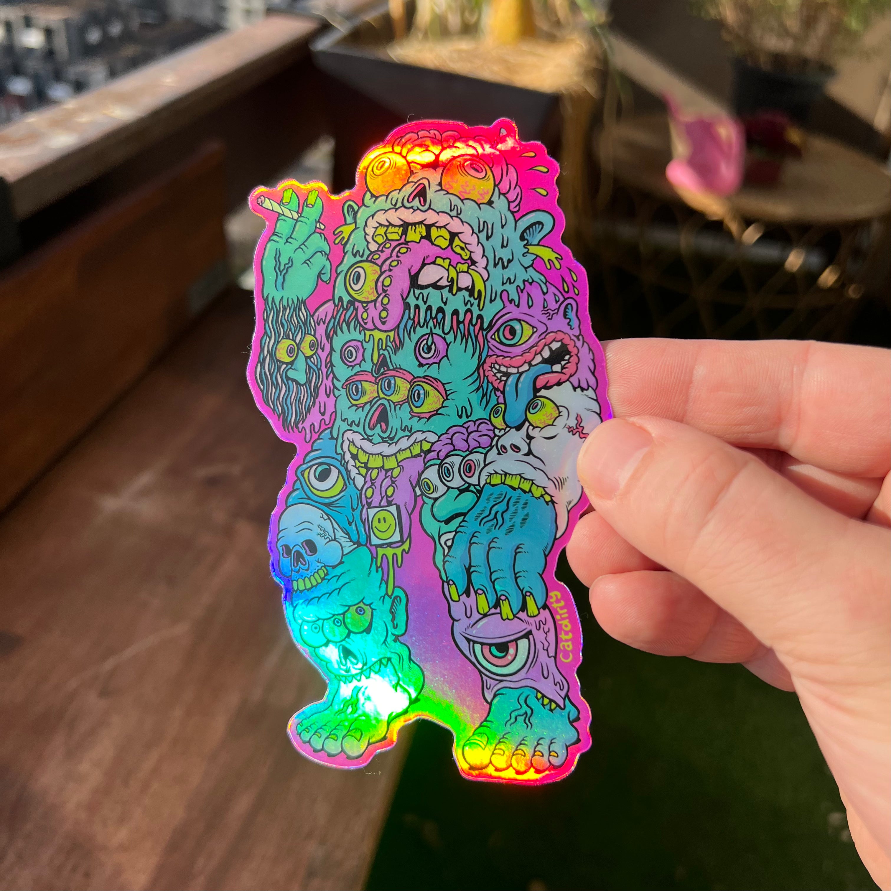 Assumption Consumption (Holographic Sticker) – CatDirty